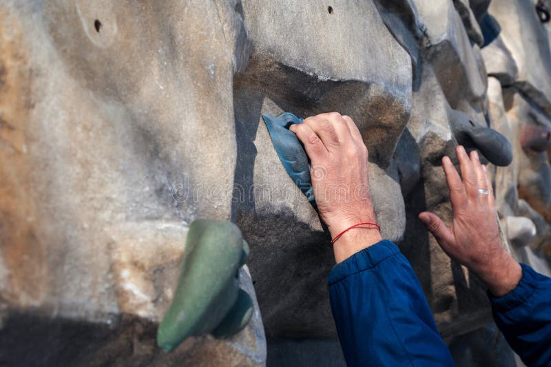 Hands of Male Climber Training on Climbing Wall Stock Photo - Image of ...