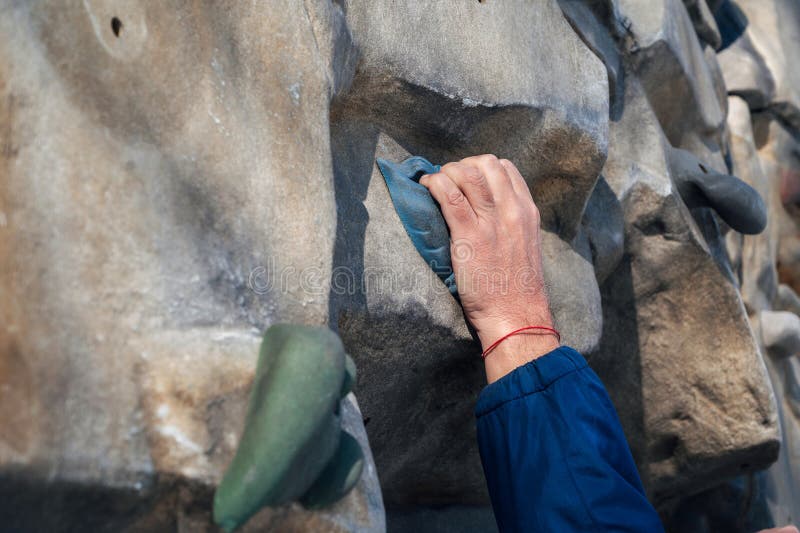 Hands of Male Climber Training on Climbing Wall Stock Photo - Image of ...