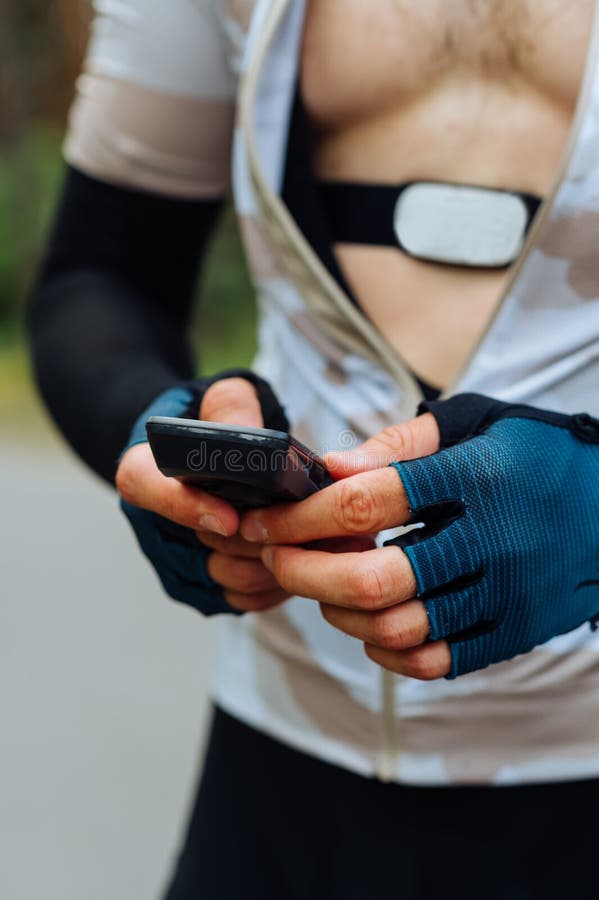 Hands of a Male Cyclist Uses a Bicycle Computer, Close-up Photo ...