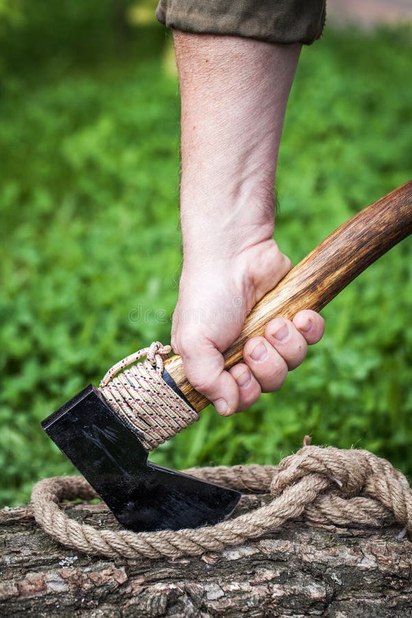 Hands of a man with axe stock photo. Image of lumberjack - 41817146