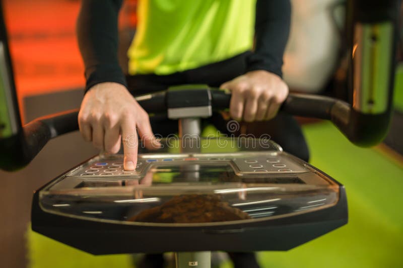 Hands of a Man on a Bicycle in the Gym Stock Image - Image of cycling ...