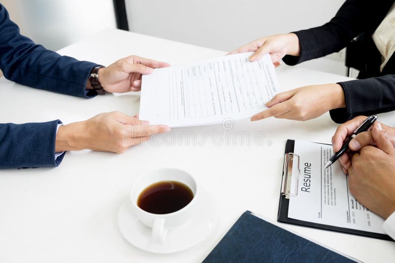 Hands of Man Giving Application Portfolio To HR Man in Office for ...