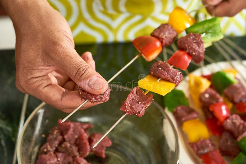 Hands of man making kebab stock photo. Image of dinner - 144353308