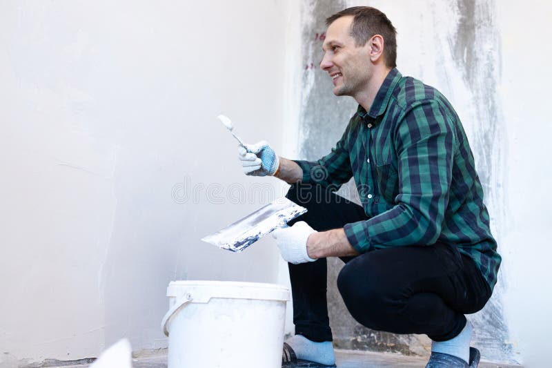 Hands Man Plasterer Construction Worker at Work with Trowel, Plastering ...