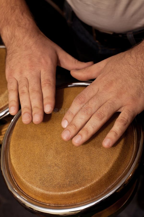 Hands of Man Playing the Bongos Stock Image - Image of african, arts ...