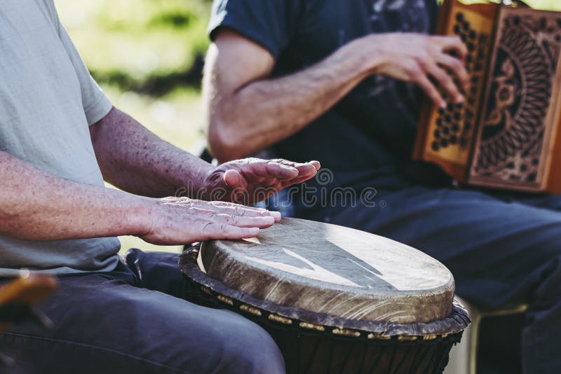 Hands of a Man Playing the Djembe Stock Image - Image of drum, hobby ...