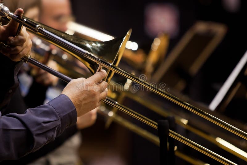 Hands of Man Playing the Trombone Stock Image - Image of instruments ...