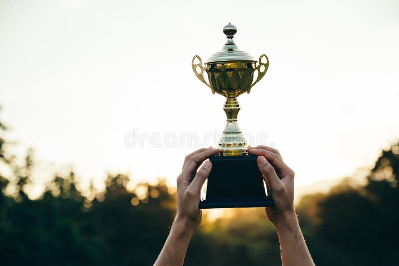 Hands of Man Raise Golden Trophy Stock Image - Image of successful ...