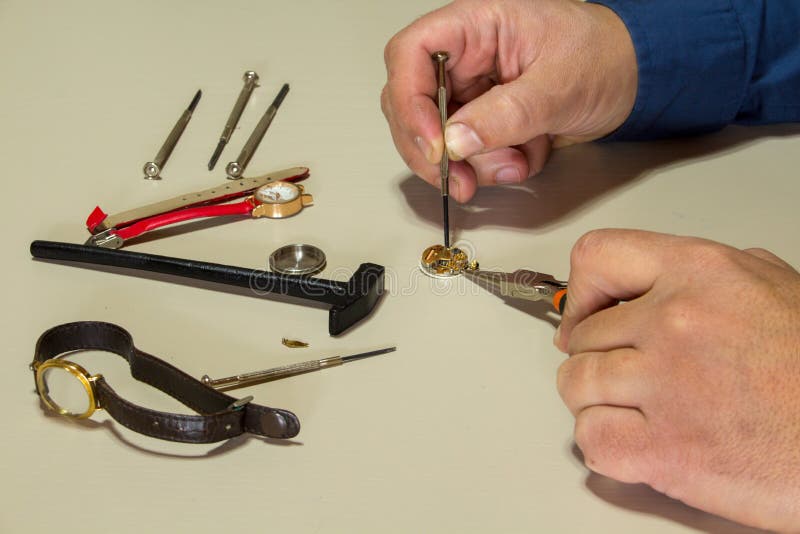 Hands of a Man while Repairing Watches. Watchmaker at Work Stock Photo ...