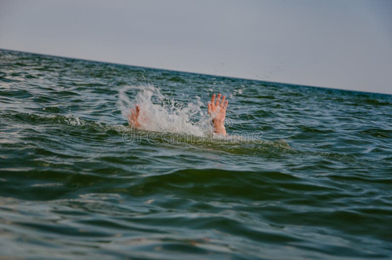 Hands of a Man in the Sea, You Can Help Stock Photo - Image of play ...