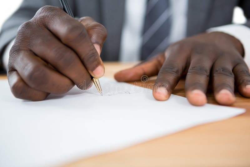 Hands of a Man Signing Document Stock Photo - Image of domestic ...