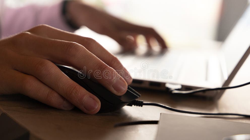 Hands of Man Typing on the Computer and with the Mouse Stock Image ...