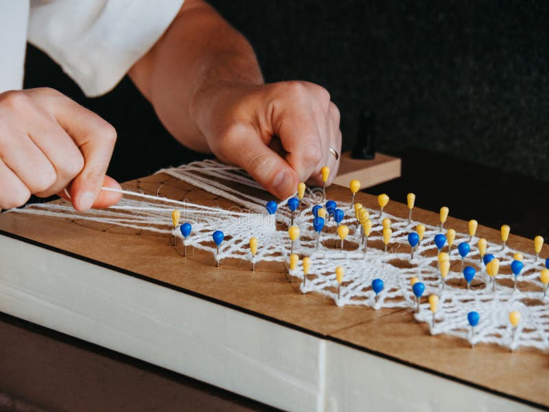 Hands of a Man Weaving Lace in a Workshop Stock Image - Image of ...