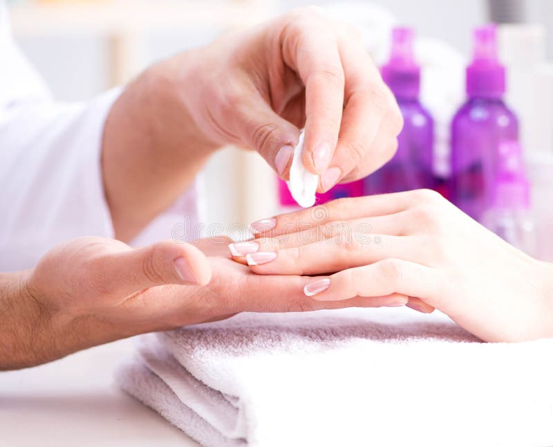Hands during Manicure Care Session Stock Photo - Image of fingers ...