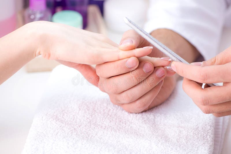 The Hands during Manicure Care Session Stock Photo - Image of ...