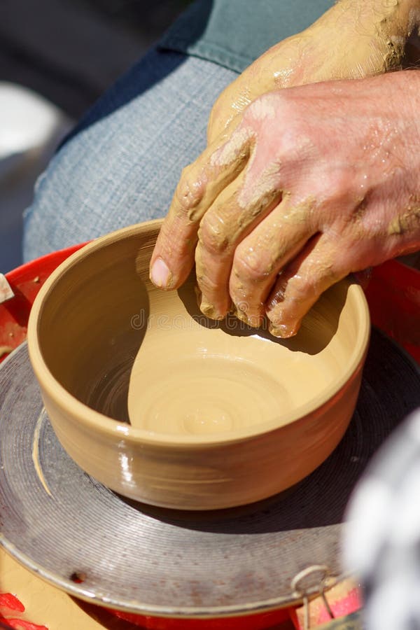Creating Clay Jar by Hands with Potter Wheel Stock Photo - Image of ...