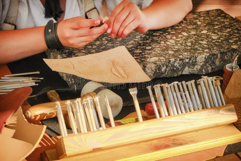 Hands of the Master Processing and Leather Tanning. Retro Shoemaker ...