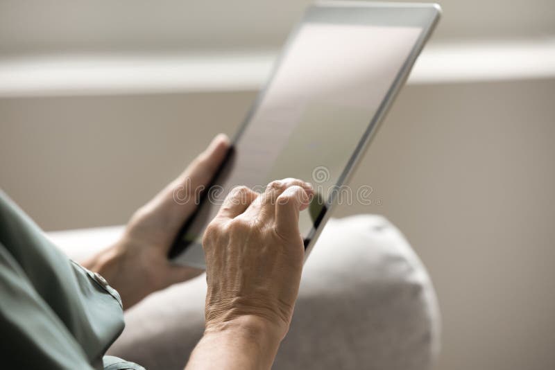 Hands of Mature Woman Holding Tablet Computer, Touching Screen Stock ...