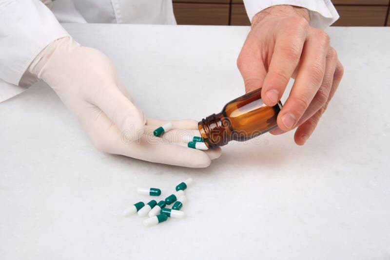 Hands and medicine pills stock photo. Image of chemistry - 23994398