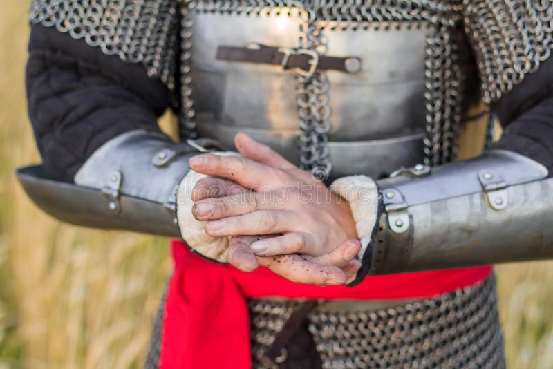 Hands of a Medieval Warrior, Close-up, Stained with Earth. Holds the ...