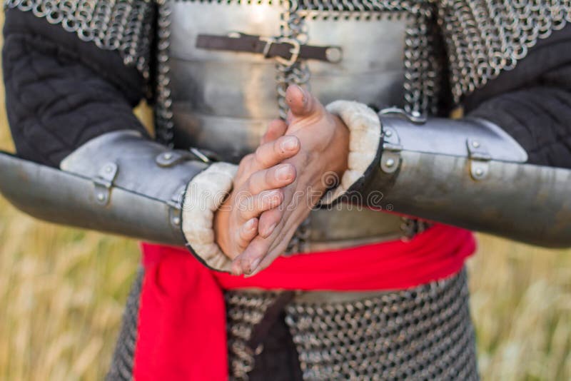 Hands of a Medieval Warrior, Close-up, Stained with Earth. Holds the ...
