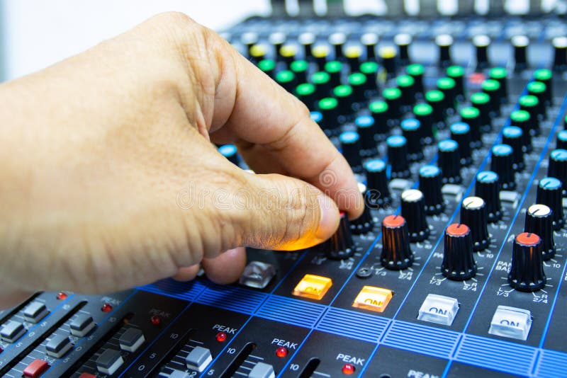 Hands of Men are Controlling the Console of a Large Hi-fi System. Sound ...