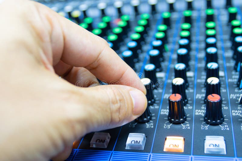 Hands of Men are Controlling the Console of a Large Hi-fi System. Sound ...
