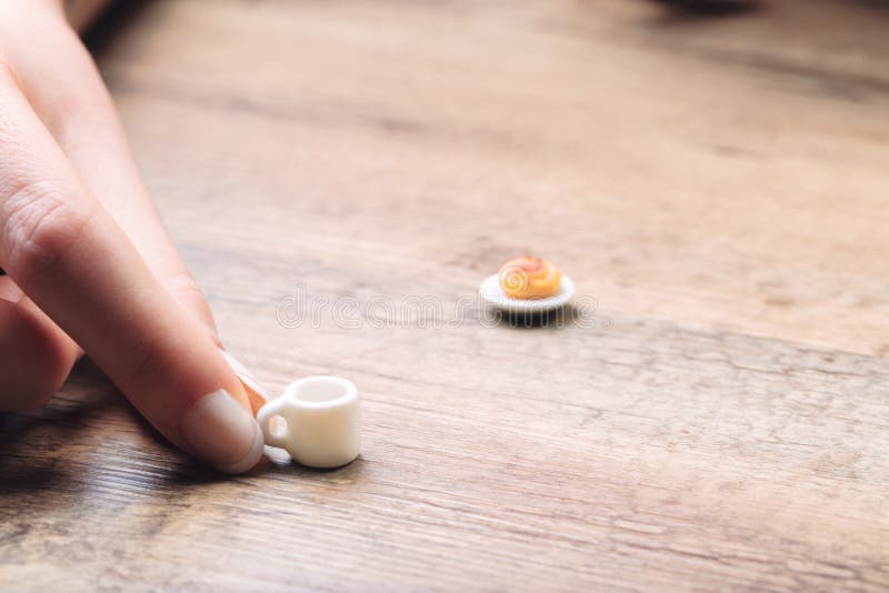 Hands with Mini Food on a Table Stock Photo - Image of fingernail ...