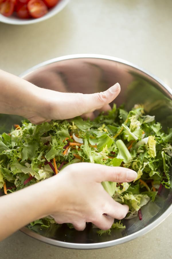 Hands Mixing Mixed Leaves Salad Preparation Stock Photo - Image of ...