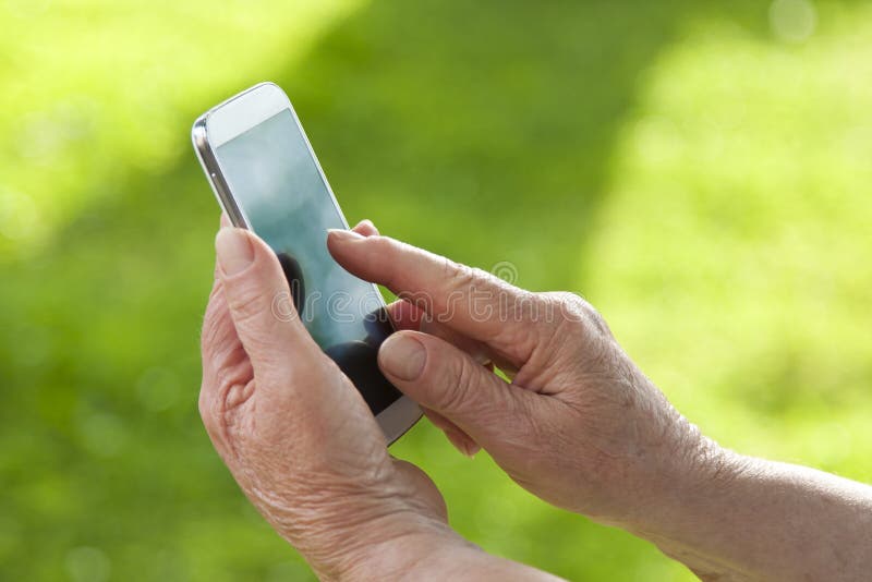 Hands with mobile phone stock photo. Image of media - 116004934