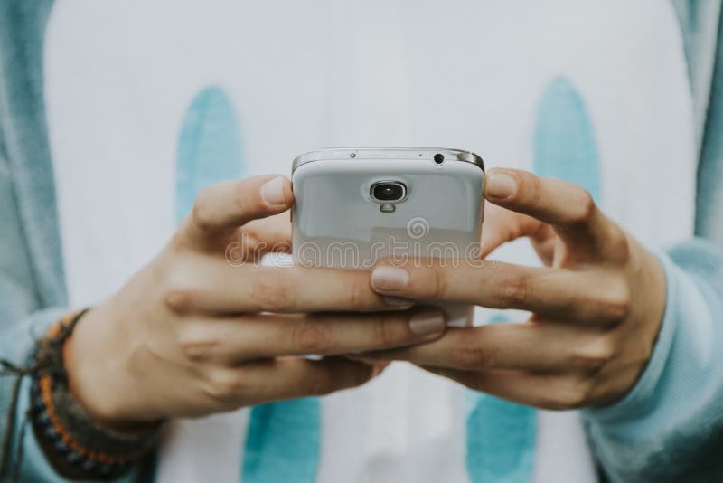 Hands with mobile phone stock image. Image of latin, outdoors - 94697349