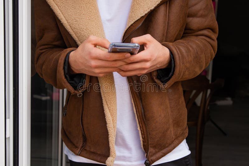 Hands with mobile phone stock photo. Image of closeup - 215772638