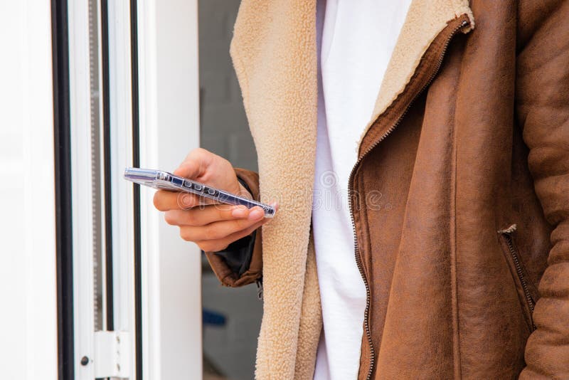 Hands with mobile phone stock photo. Image of media - 116004934