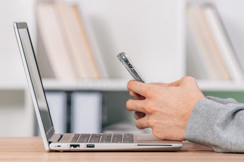 Hands with Mobile Phone and Laptop Computer Stock Photo - Image of ...