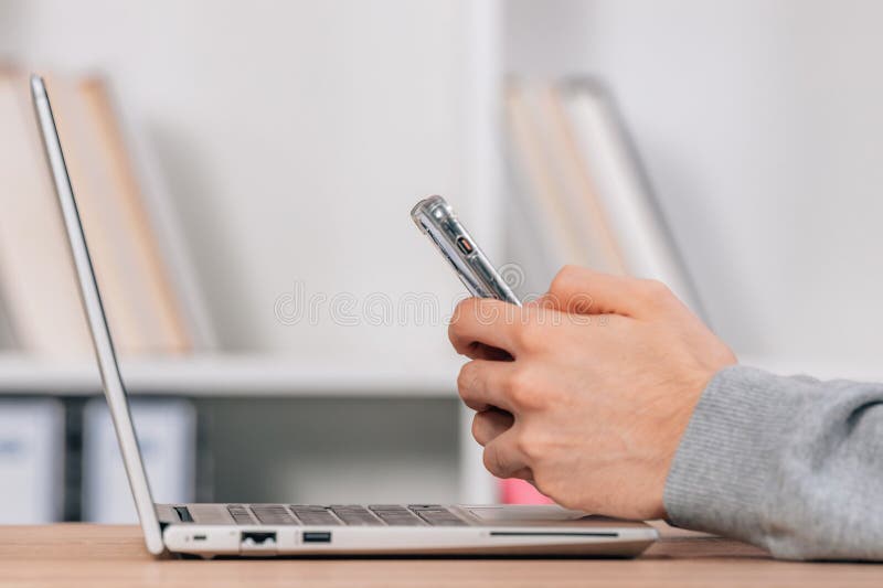 Hands with Mobile Phone and Laptop Computer Stock Photo - Image of ...
