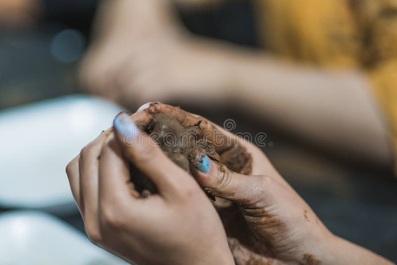 Hands Molding Clay in a Clay Workshop To Teach People How To Mold the ...