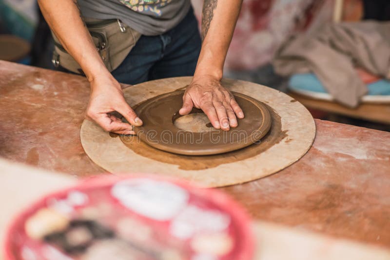 Hands Molding Clay in a Clay Workshop To Teach People How To Mold the Material To Create Figures ...