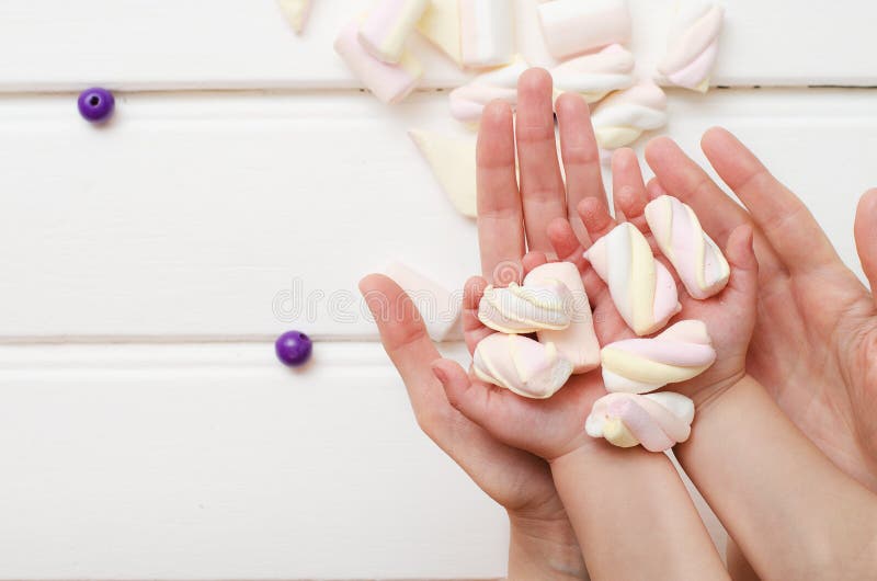In the Hands of Mom and Baby Sweet Air Candy Stock Image - Image of ...