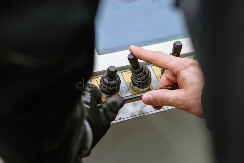 Hands Moving the Levers of the Electrical Machine. Automation Stock ...