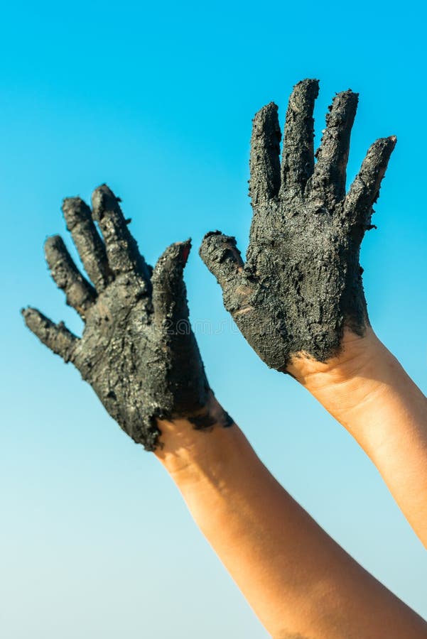 Hands with healing mud stock image. Image of medical - 34150483