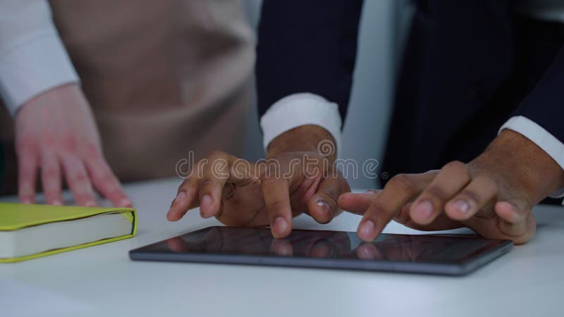 Hands of People Using Tablet at Business Meeting Stock Image - Image of ...