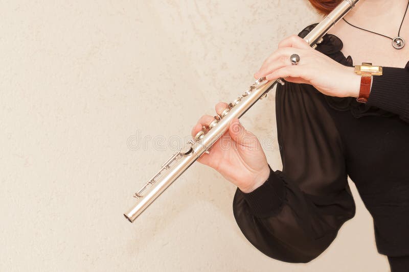 Hands with a Musical Instrument Stock Photo - Image of player, silver ...