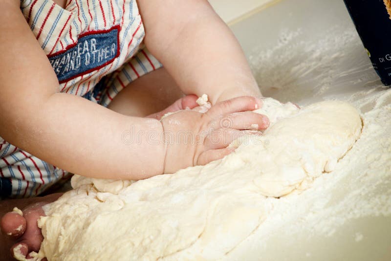 Hands of a Newborn Baby in the Dough Stock Image - Image of making ...
