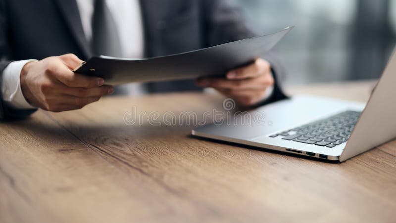 Hands in the Office Hold a Contract, Close-up Stock Image - Image of ...