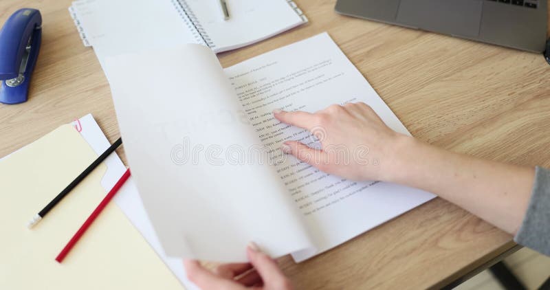 The Hands in the Office Hold the Script Over the Table Stock Footage ...