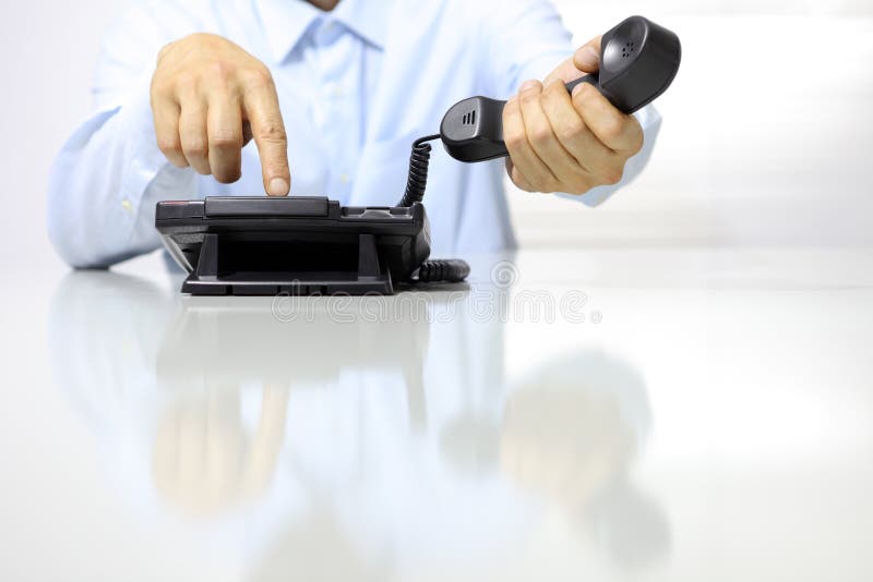 Hands with Office Phone on Desk Stock Photo - Image of cable, device ...