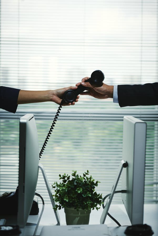 Passing telephone receiver stock image. Image of technology - 102608571