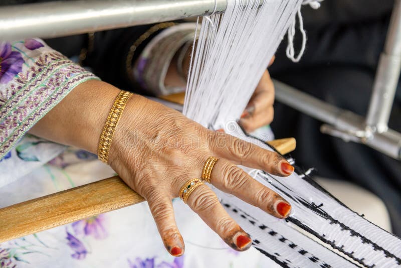 Hands of Old Emirati Lady Using Traditional Weaving Machine Stock Photo ...