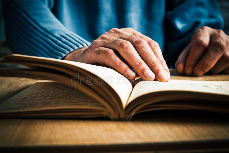 Hands and book stock image. Image of education, close - 133889049