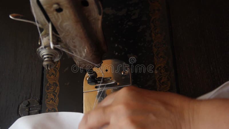 Hands of an Old Woman Scribbling White Cloth on an Old Manual Sewing ...